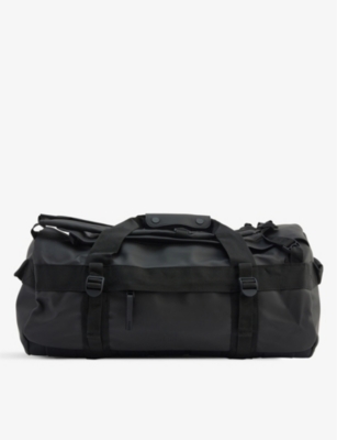 RAINS - Small shell duffel bag | Selfridges.com