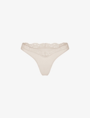 SKIMS - Lace-trim low-rise stretch-woven thong | Selfridges.com