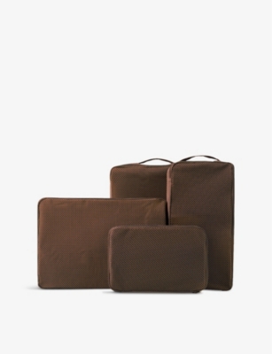 JULY - Set of 4 packing cubes | Selfridges.com