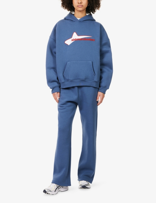 SISTERS & SEEKERS - Brand-Print Wide-Leg Cotton-Blend Jogging Bottoms ...